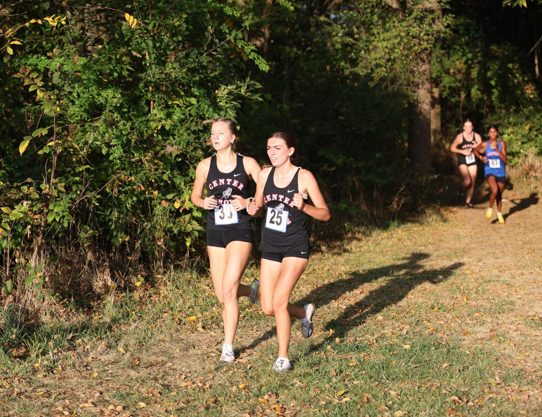 Girls and boys cross country teams run at Nike Twilight meet – Trojaneer